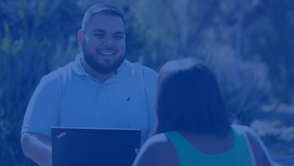 bear help staff smiles at student | Information Technology Solutions